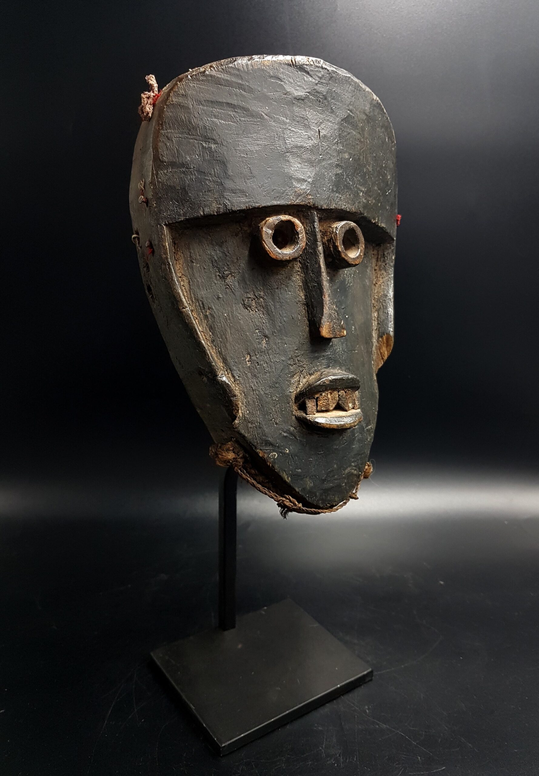 Rare wooden mask with black lacquered patina - Salon des Antiquaires ...